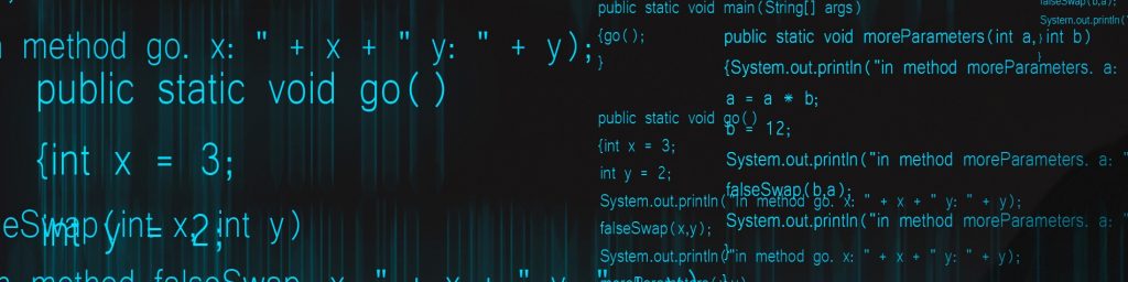 Faceless hooded anonymous computer hacker with programming code from ... Faceless hooded anonymous computer hacker with programming code from ...